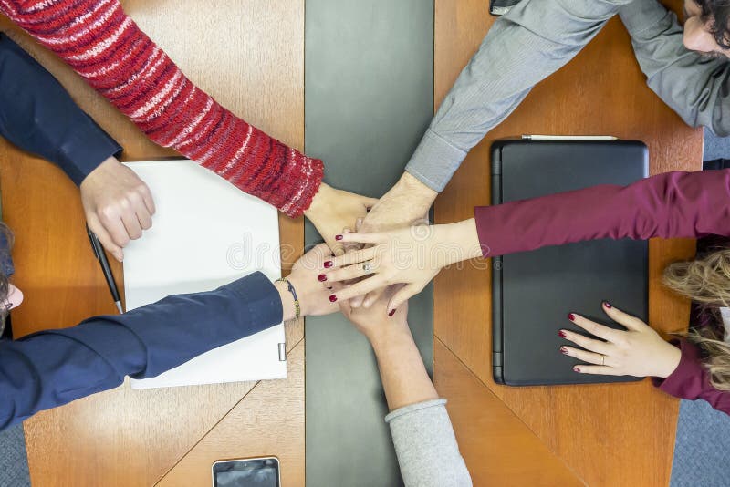 Business People Showing Team Work and Giving Five in Office. Stock ...