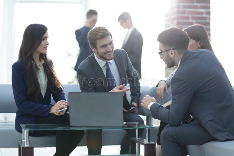 Beautiful Business People are Using Gadgets, Talking and Smiling Stock ...