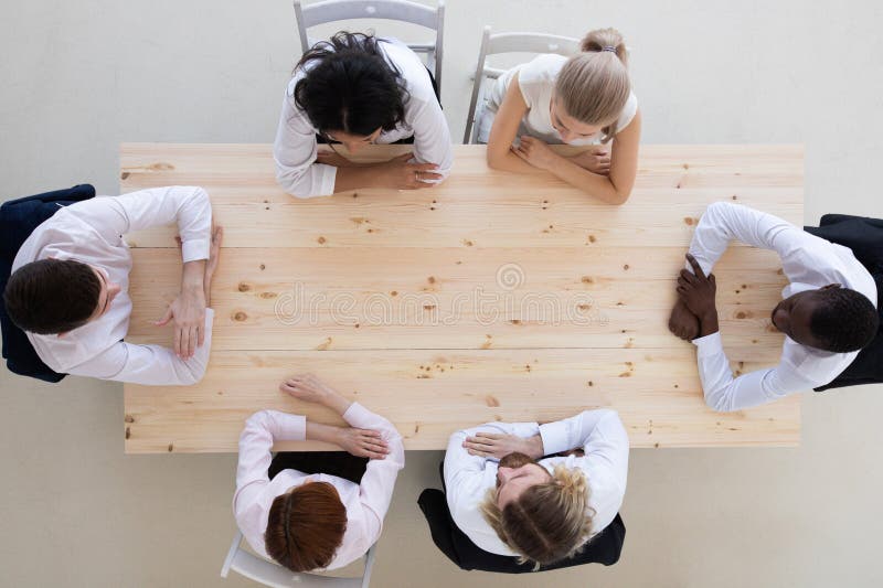 Business People Sitting Around Empty Table Stock Image - Image of ...