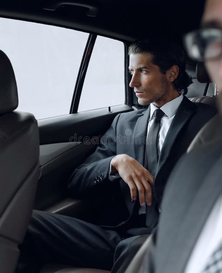 Business People Sitting in Car Stock Image - Image of news, drive ...