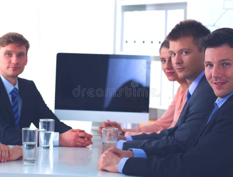 Business People Sitting and Discussing at Business Meeting, in Office ...
