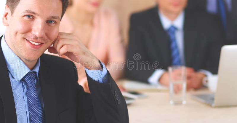 Business People Sitting and Discussing at Business Meeting, in Office ...
