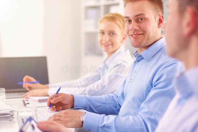 Business People Sitting and Discussing at Meeting, in Office Stock ...