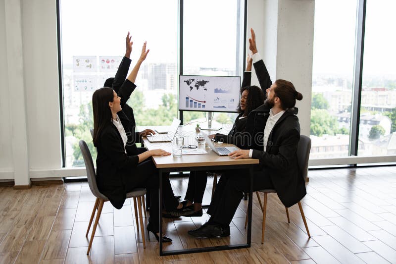 Business Team Celebrating Successful Project Completion in Office Stock ...