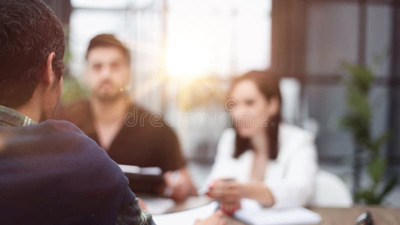 Business People Sitting at the Table Talking Back View Stock Image ...