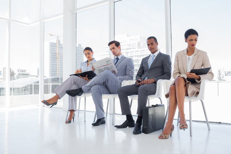 Business People Sitting in Waiting Room Stock Photo - Image of ...