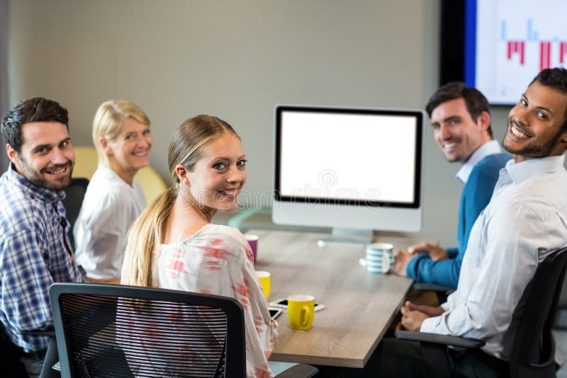 Business People Smiling at Camera during a Video Conference Stock Image ...