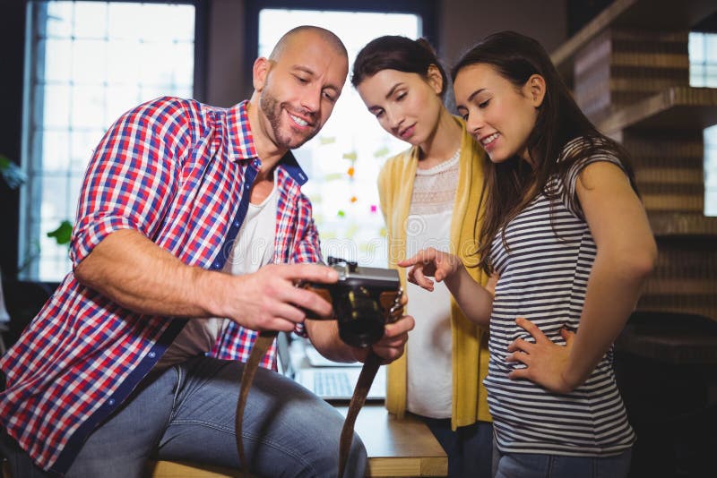 Business People Smiling while Looking at Camera Stock Photo - Image of ...