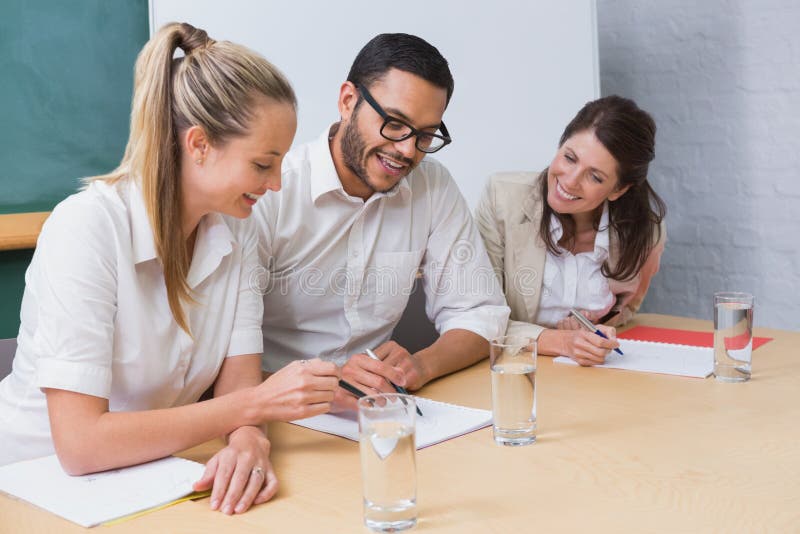 Business People Speaking about Notes that they Took Stock Image - Image ...