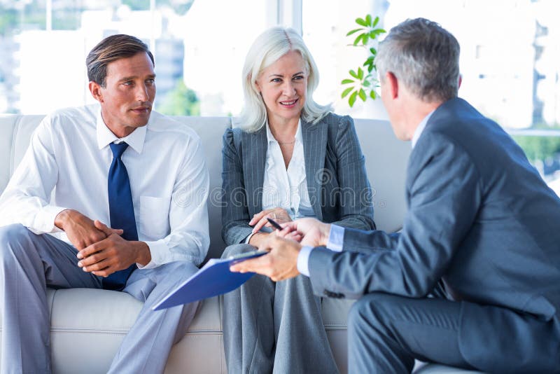 Business People Speaking Together on Couch Stock Photo - Image of adult ...