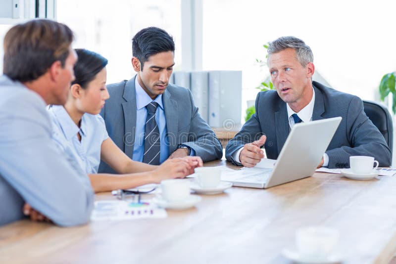 Business People Speaking Together during Meeting Stock Image - Image of ...