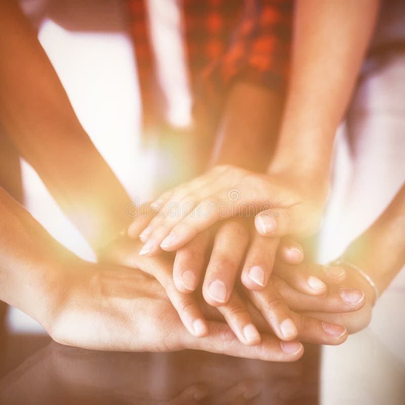 Business People Stacking Hands on Table in Office Stock Image - Image ...