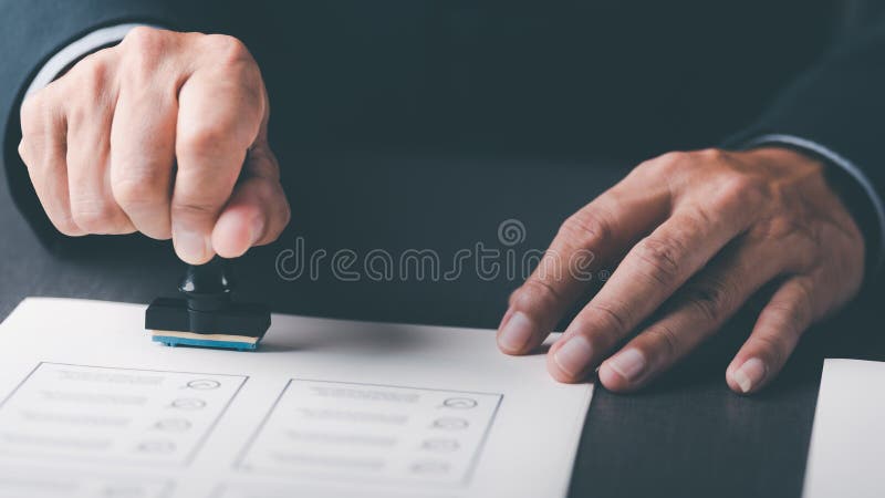 Business People Stamp on the Contract Documents at the Desk, the ...