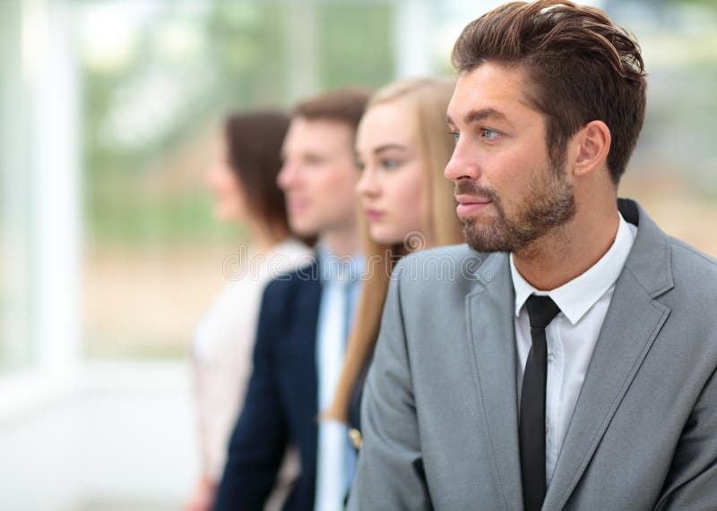 Business People Standing in a Row Looking in Same Direction Stock Photo ...