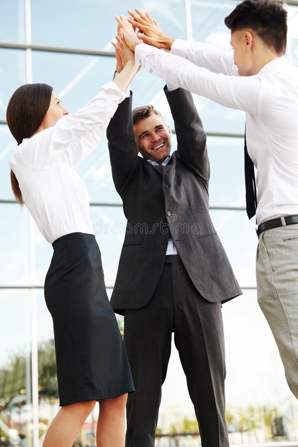 Business People. Successful Team Celebrating a Deal Stock Photo - Image ...