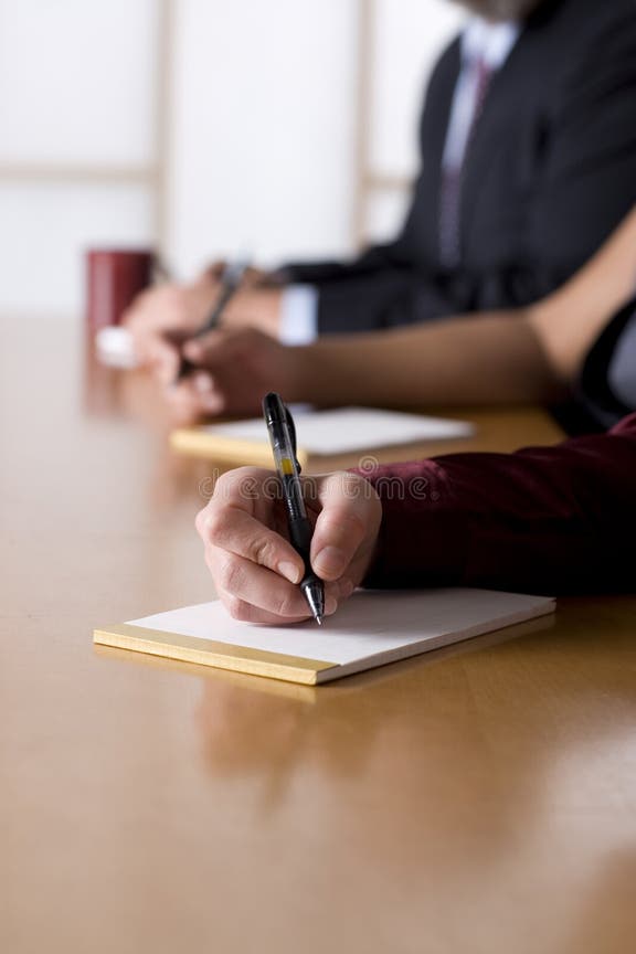 Business People Taking Notes in a Meeting Stock Photo - Image of notes ...