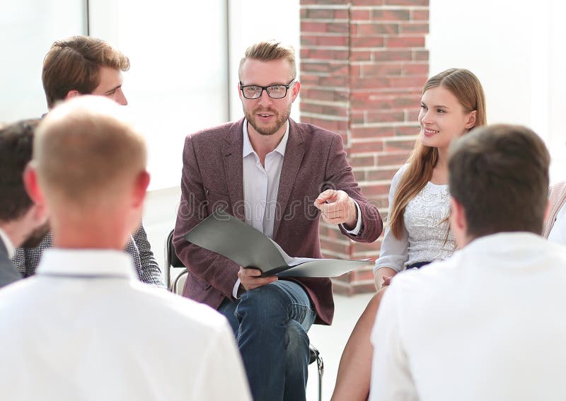 Business People Talk at a Group Meeting in a Circle. Stock Photo ...