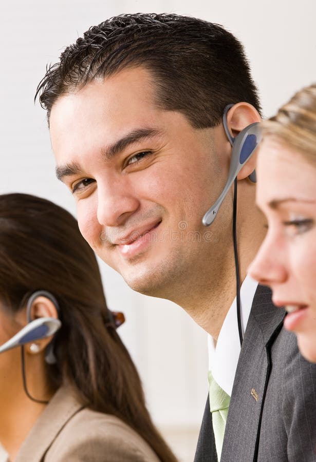 Business People Talking on Headsets Stock Image - Image of desk, head ...