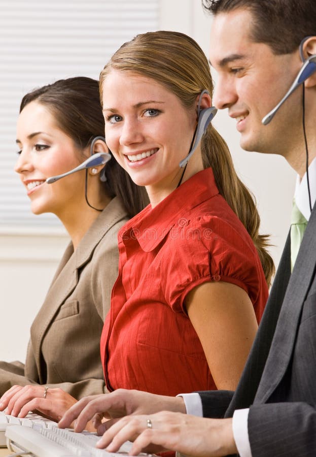 Business People Talking on Headsets Stock Image - Image of desk, head ...