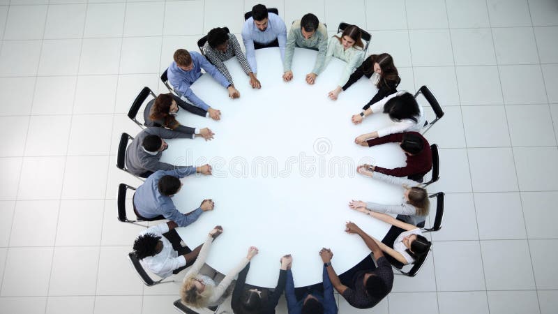 Business People Talking in Office Sitting at a Round Table Stock Image ...