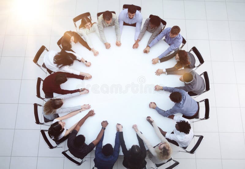 Business People Talking in Office Sitting at a Round Table Stock Photo ...