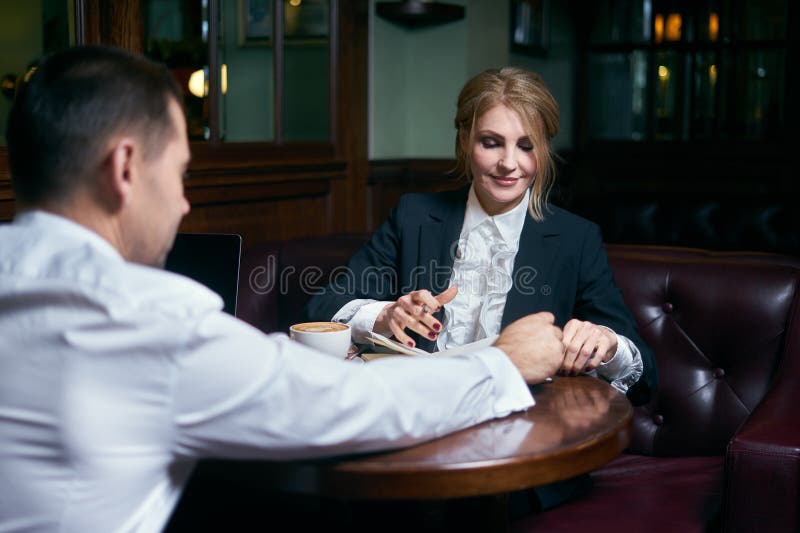 Business People Talking Over Coffee in Cafe Stock Photo - Image of ...