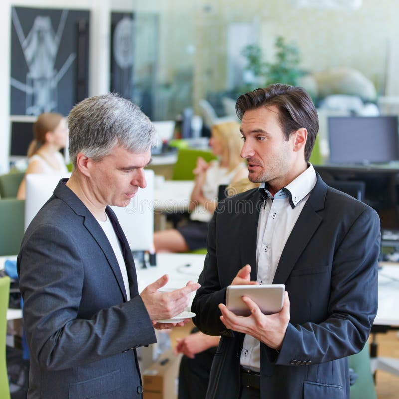 Business People Talking about Tablet Computer Stock Photo - Image of ...