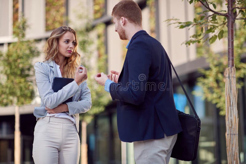 Business People Talking Together and Standing Outdoors Stock Image ...