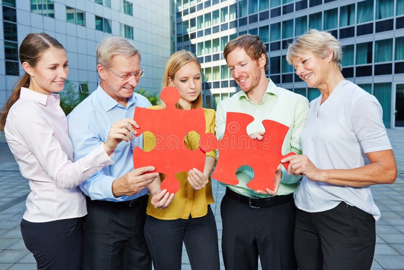 Business People Team Solving Jigsaw Puzzle Stock Photo - Image of ...