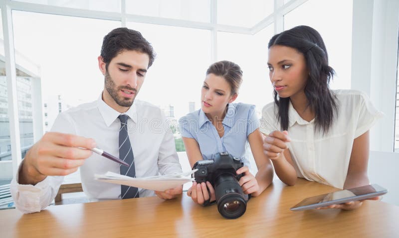 Business People Using a Camera Stock Image - Image of suit, female ...