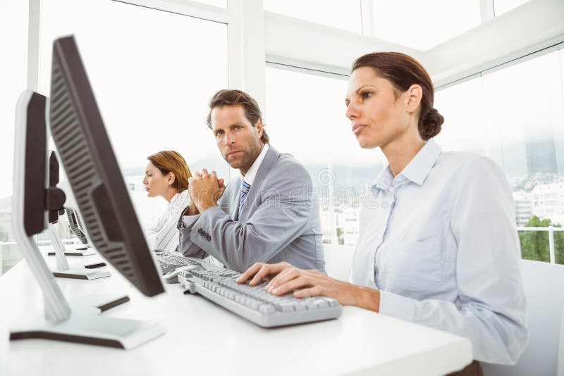 Business People Using Computers in Office Stock Photo - Image of ...