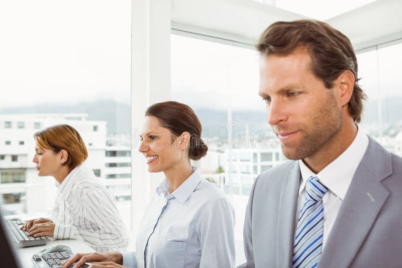 Business People Using Computers in Office Stock Photo - Image of ...