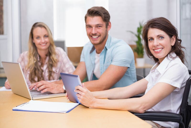 Business People Using Digital Tablet and Laptop in Meeting Stock Photo ...