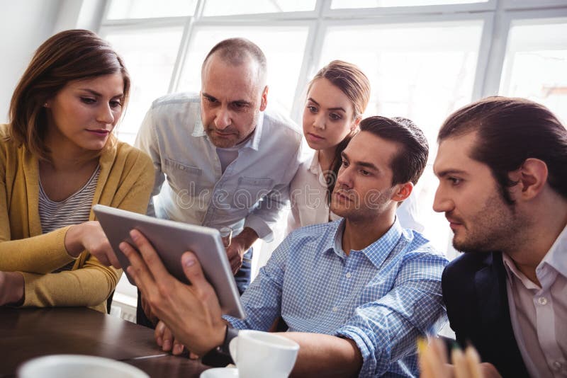 Business People Using Digital Tablet in Office Stock Photo - Image of ...
