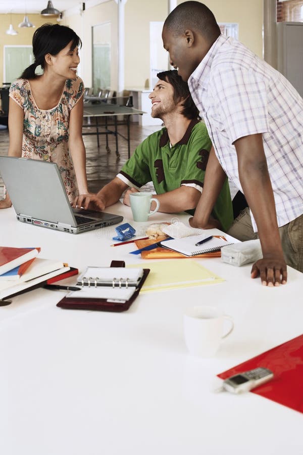 Business People Using Laptop at Conference Table Stock Image - Image of ...