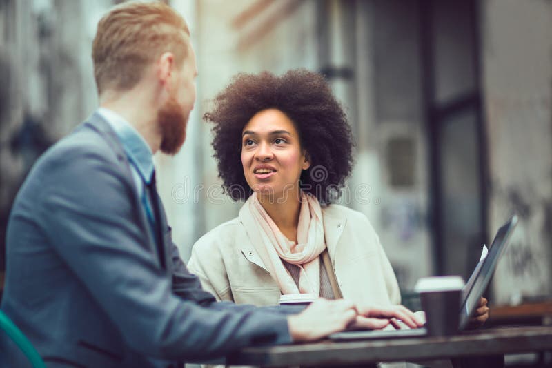 Business People Using Laptop Outdoor. Stock Image - Image of mixed ...