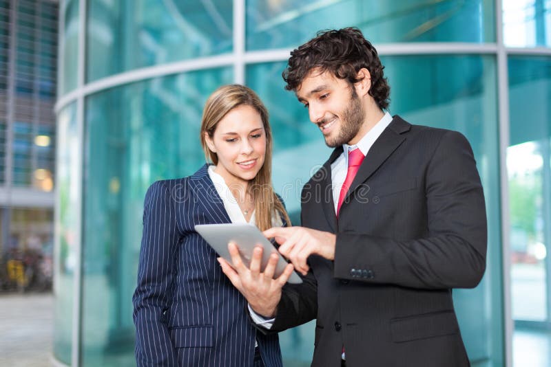 Business People Using a Tablet Stock Image - Image of connection ...
