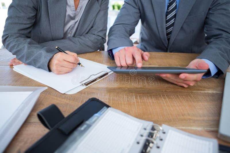 Business People Using Tablet in Office Stock Photo - Image of ...