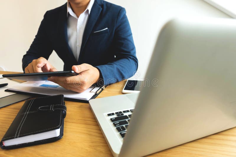 Business People Using Tablet To Study Data for Business Expansion ...