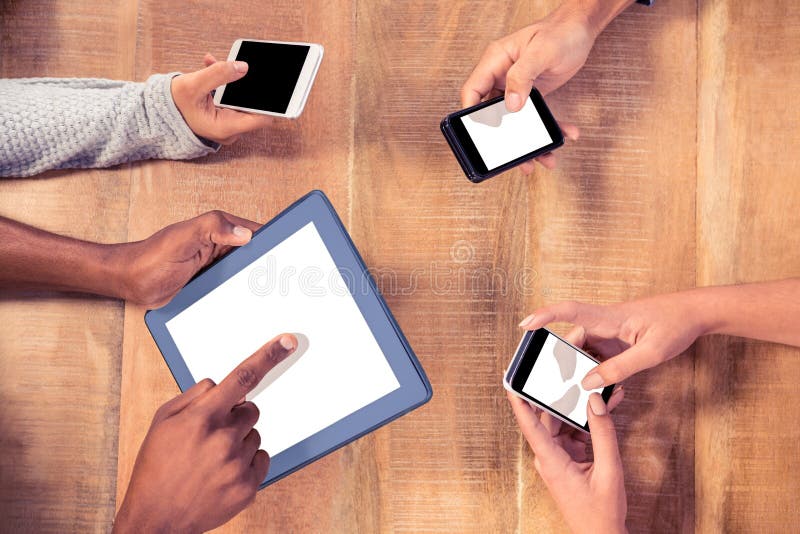 Business People Using Technologies at Desk Stock Photo - Image of ...