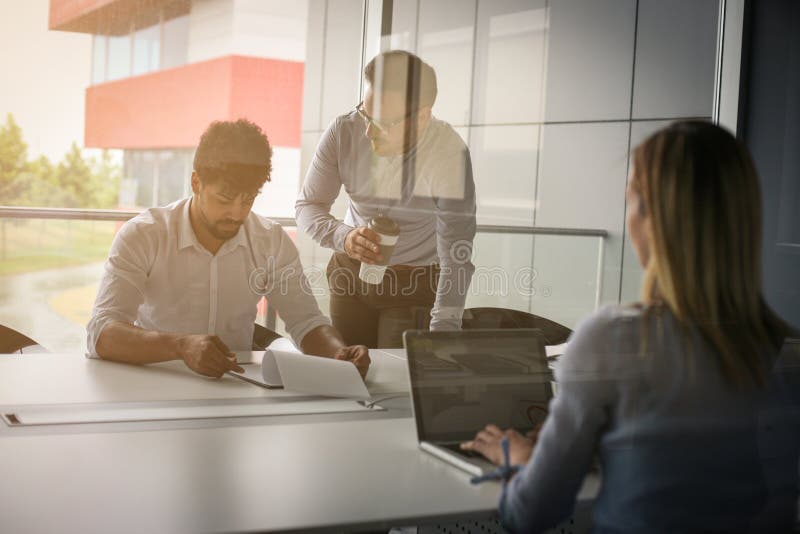 Business People Using Technology and Checking Document. Business Stock ...