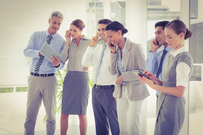 Business People Using Their Phone Stock Image - Image of businesswoman ...