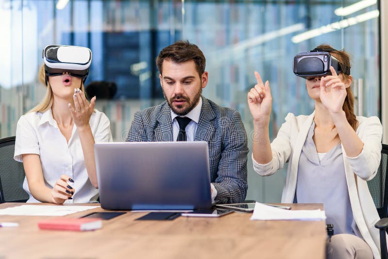 Business People Using Virtual Reality Goggles during Meeting. Team of ...