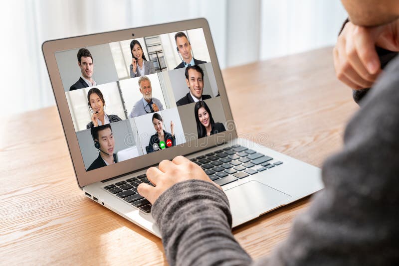 Business People on Video Conference for Modish Virtual Group Meeting ...