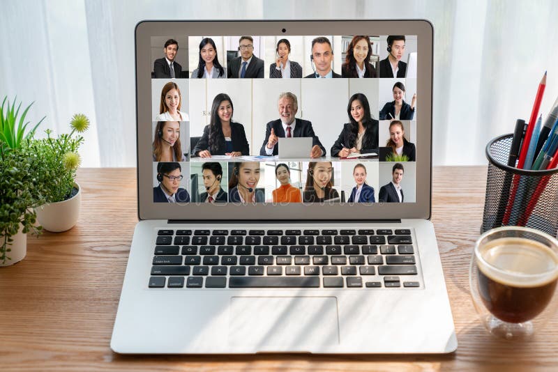 Business People on Video Conference for Modish Virtual Group Meeting ...