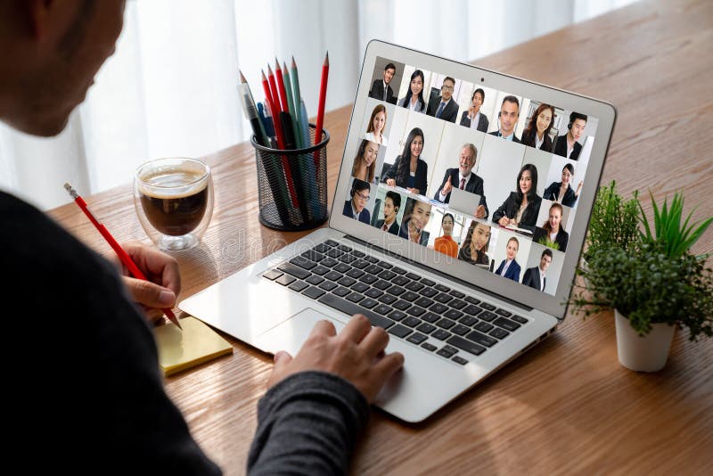 Business People on Video Conference for Modish Virtual Group Meeting ...