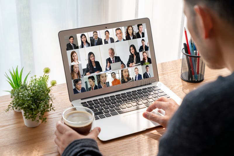 Business People on Video Conference for Modish Virtual Group Meeting ...