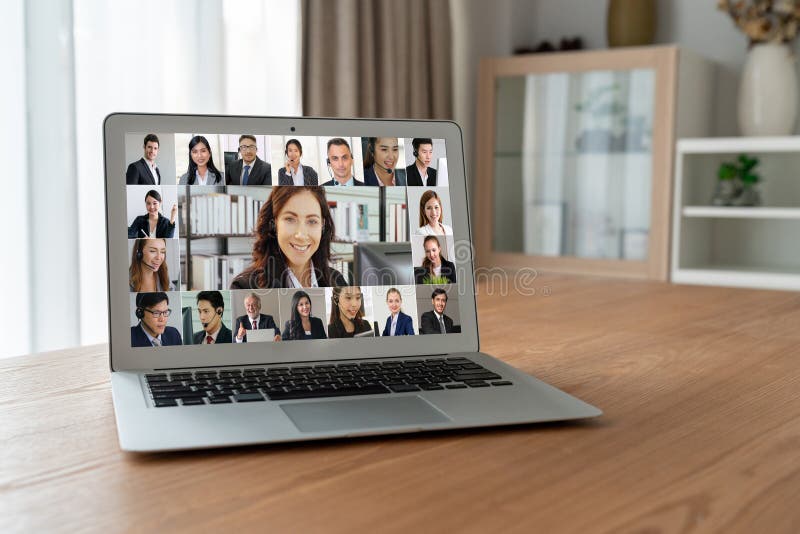 Business People on Video Conference for Modish Virtual Group Meeting ...