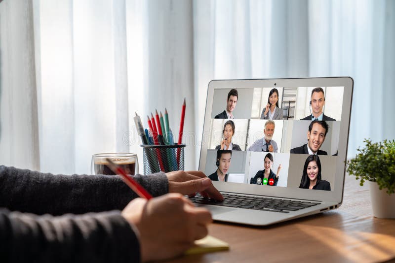Business People on Video Conference for Modish Virtual Group Meeting ...