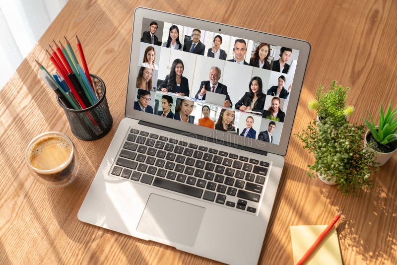 Business People on Video Conference for Modish Virtual Group Meeting ...